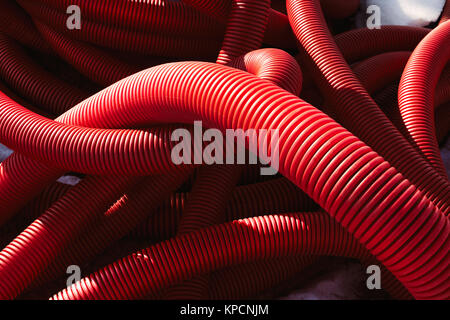 red corrugated pipes BACKGROUND Stock Photo - Alamy