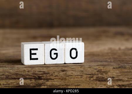 The word ego written in cubes on a wooden background Stock Photo - Alamy