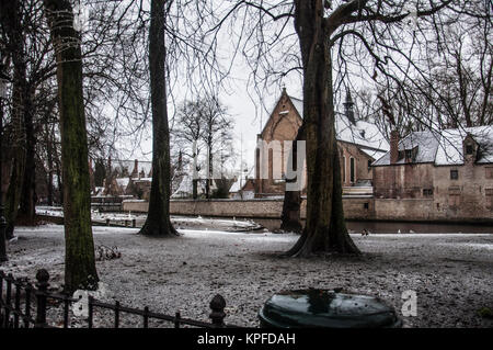 street of bruges, snowing day, snow, brugge, flanders, belgium Stock ...