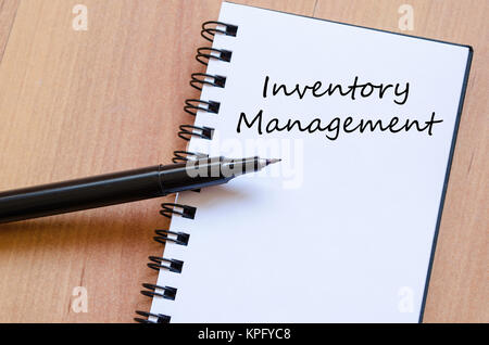 Inventory management write on notebook Stock Photo - Alamy