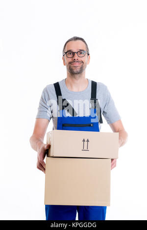 friendly postman with parcels in front of white background Stock Photo ...