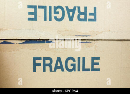 corrugated parcel box fragile packet shipping sheet of paper paper cardboard Stock Photo - Alamy