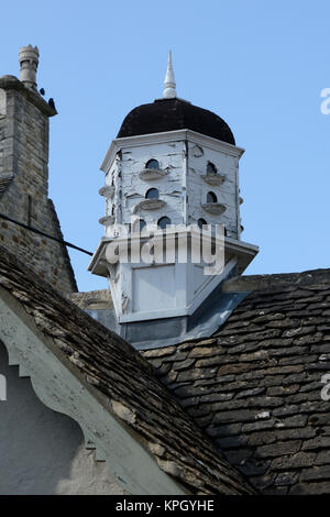 Dovecot on roof of building in the High Street of Burford, Oxfordshire ...