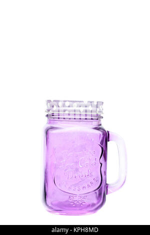 Violet mason glass on white background, stock photo Stock Photo - Alamy