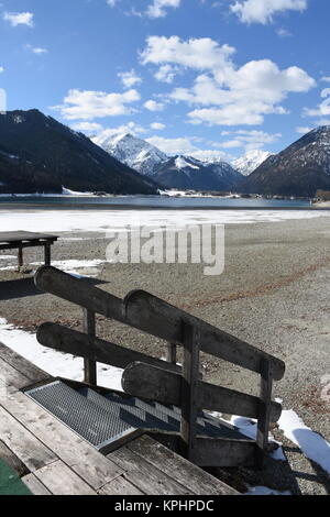 winter tyrol fresh water lake inland water water tree trees mountains ...