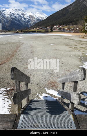 winter tyrol fresh water lake inland water water tree trees mountains ...