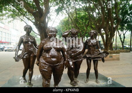 Urban sculpture landscape: female figure statues Stock Photo - Alamy