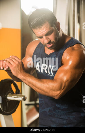 Muscular Lebanese male in the gym Stock Photo - Alamy