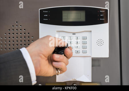 Businessperson Hand Operating Security System Stock Photo - Alamy