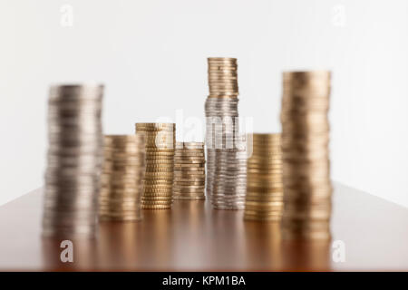 coin stacks focus on fourth stack Stock Photo - Alamy