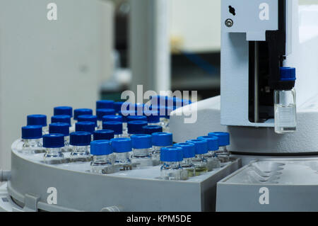 Auto sample with glass vials and blue caps for HPLC analysis of the ...