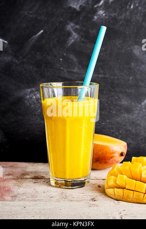 delicious ripe mango prepared in hedgehog cut style with natural green ...
