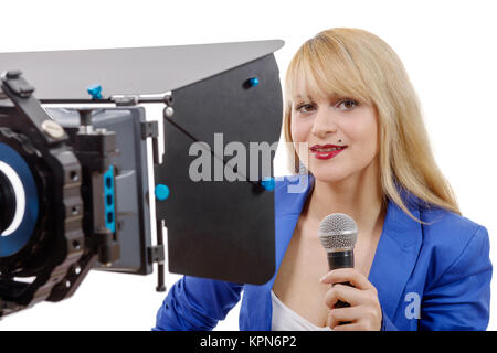 a portrait of elegant woman TV reporter , who is smiling and looking ...