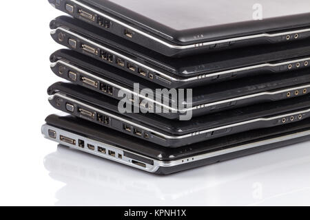 Pile of old used laptop computers, digital tablets, smartphones for ...