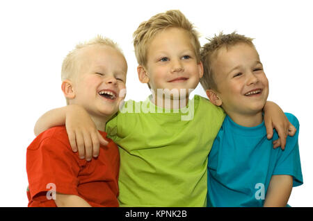 Happy friends hugging and laughing loud at home Stock Photo - Alamy