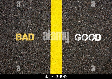Antonym concept of BAD versus GOOD written over tarmac, road marking ...