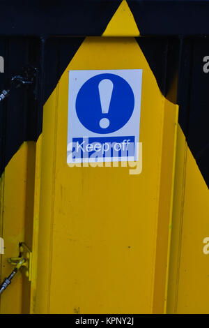 Danger - Keep Off sign with an industrial building in the background ...