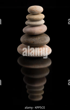 balancing zen stones on black Stock Photo - Alamy