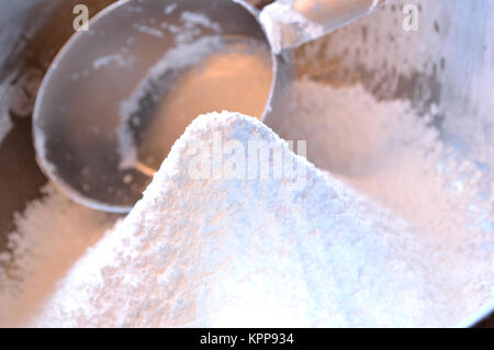 White Sugar in a Measuring Cup Stock Photo - Alamy