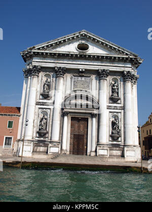 Baroque Gesuati church on Dorsoduro waterfront Venice reflected across ...
