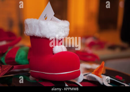 Merry Christmas composition. Santa's shoe with gift boxes isolated on ...