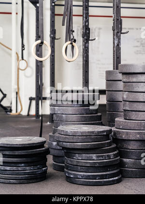 A stack of iron weights Stock Photo - Alamy