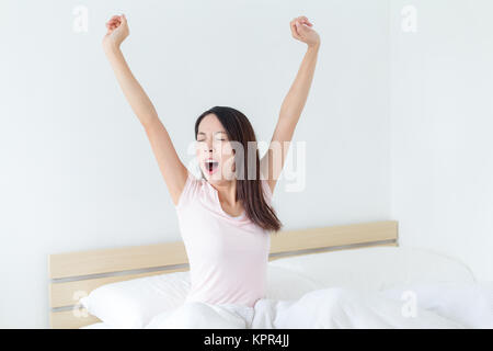 Photo of cheerful delighted girl raise fists triumph attainment toothy ...