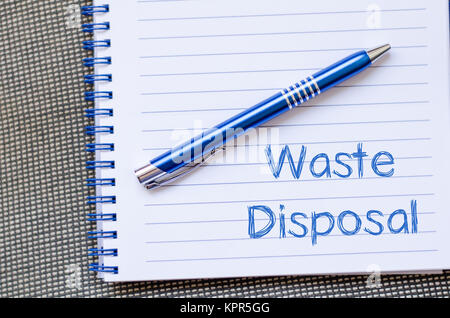 Waste disposal write on notebook Stock Photo - Alamy