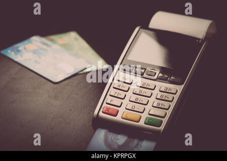 Color image of a POS and credit cards Stock Photo - Alamy