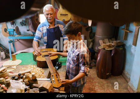 Lute Maker Grandpa With Diapason Tuning Guitar Boy Grandson Stock Photo ...