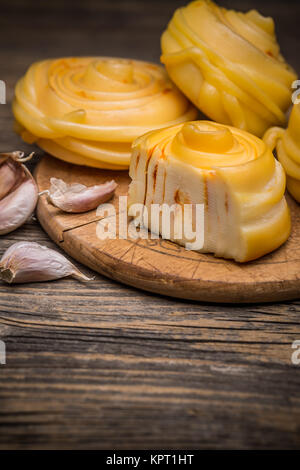 Handicraft twisted cheese Stock Photo - Alamy