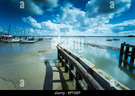 The lock at Heybridge Basin, Essex with boats moored in the basin in ...