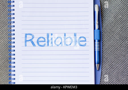Reliable write on notebook Stock Photo - Alamy