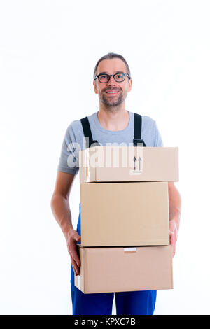 friendly postman with parcels in front of white background Stock Photo ...
