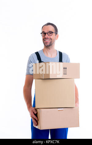 friendly postman with parcels in front of white background Stock Photo ...