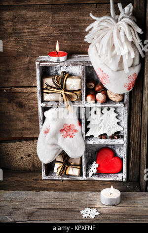 symbolic Christmas decoration with box mittens with Christmas tree and ...