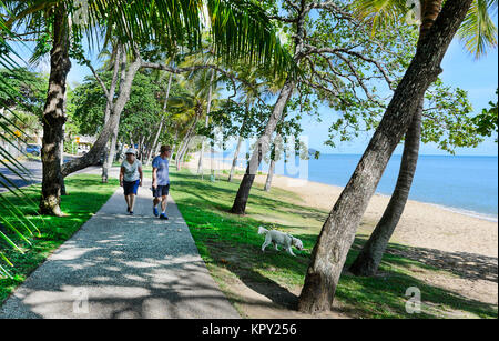 Person walking along the beach at Trinity Beach, Cairns Northern ...