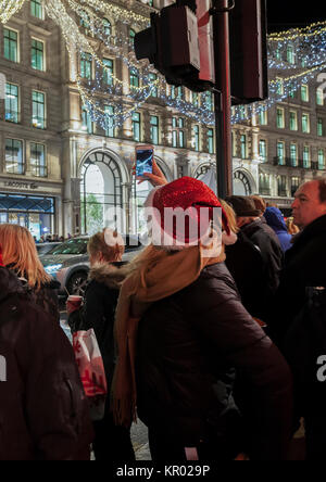 A night time street photography with busy streets and modern buildings ...