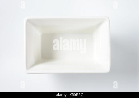 Deep rectangular white ceramic dish with handles Stock Photo - Alamy
