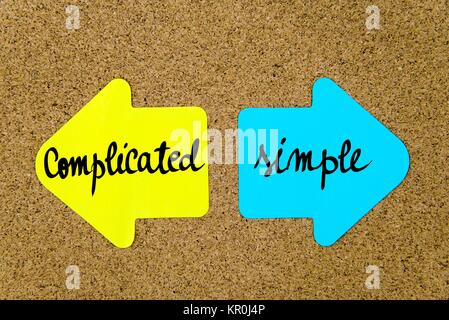 Opposite arrows with Complicated versus Simple.. Hand drawing with ...