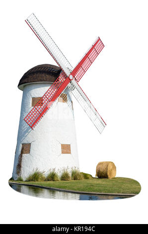Windmill and straw in the lawn Stock Photo - Alamy