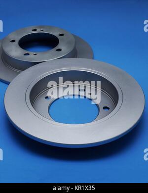 The new metal brake discs of the car on white background, panoramic ...