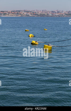 Yellow navigation buoy floats on rippling river Stock Photo - Alamy