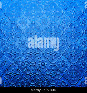 blue color glass with thai pattern style Stock Photo - Alamy
