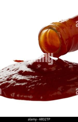 Spilled tomato sauce or ketchup on a blue t-shirt. Food preparation ...
