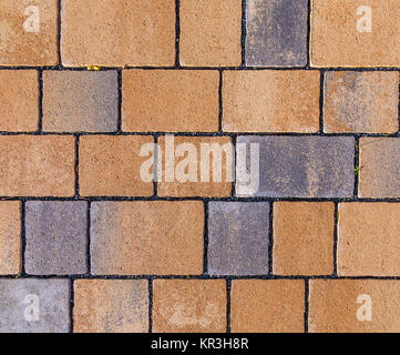 red Paving blocks made of square stone in bright ligh Stock Photo - Alamy