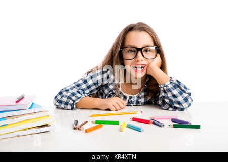 Little girl at school making drawings and painting Stock Photo - Alamy