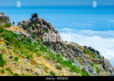 View on mountain and clouds from plane Stock Photo - Alamy