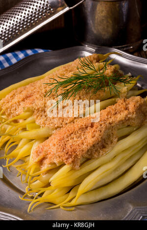 Yellow beans with butter and breadcrumbs Stock Photo - Alamy
