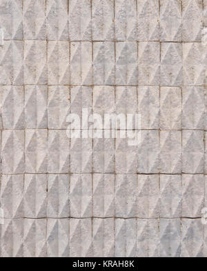 Grey stone tiles with rough surface at house wall Stock Photo - Alamy